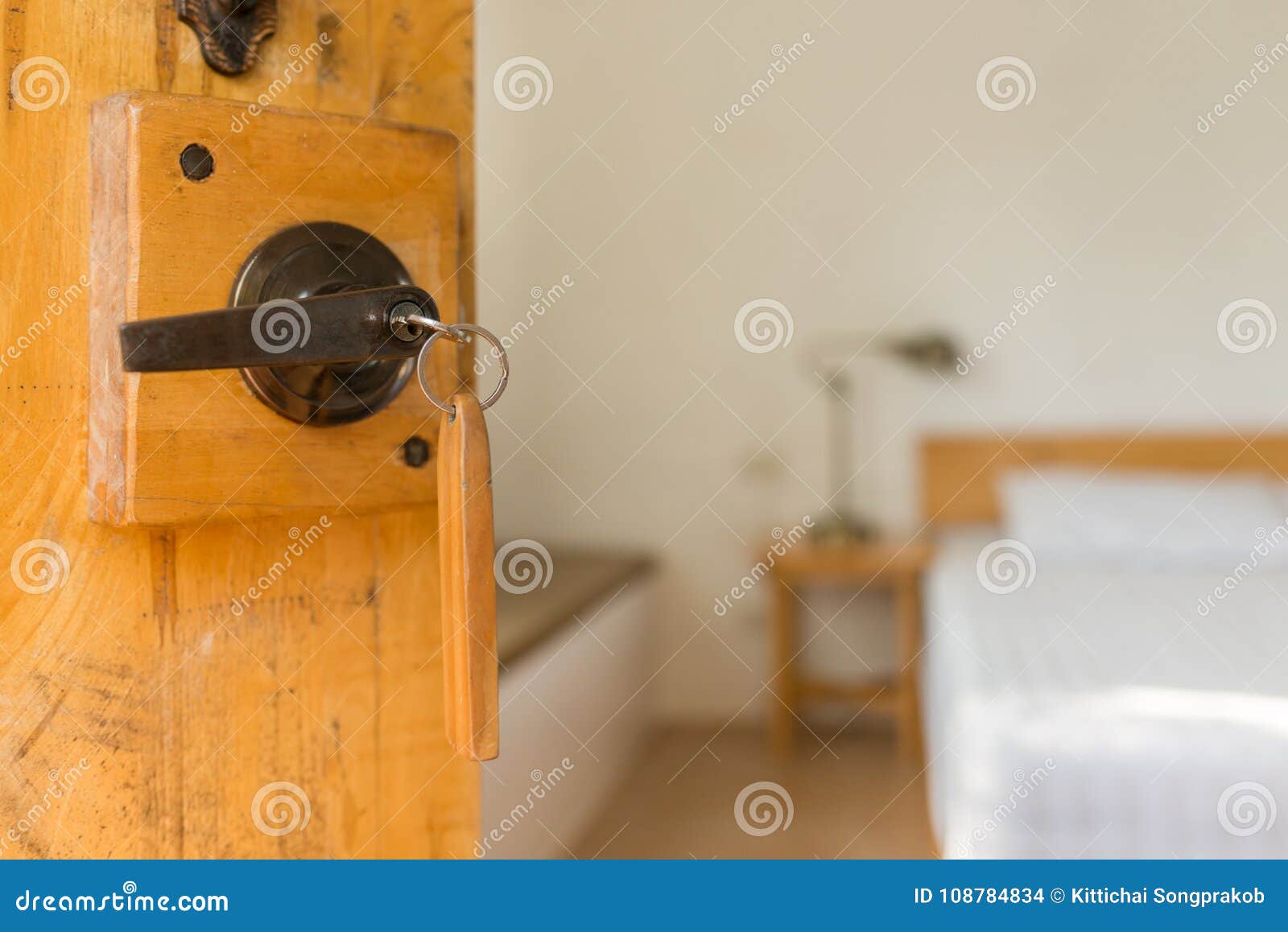 Half Opened Door of a Bed Room, Key in Keyhole Stock Photo - Image of ...