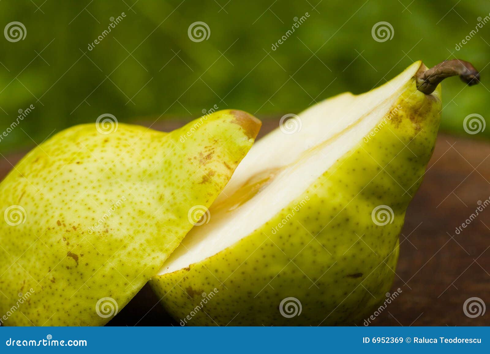 Half Pear Over Green Background Stock Image - Image of agriculture ...