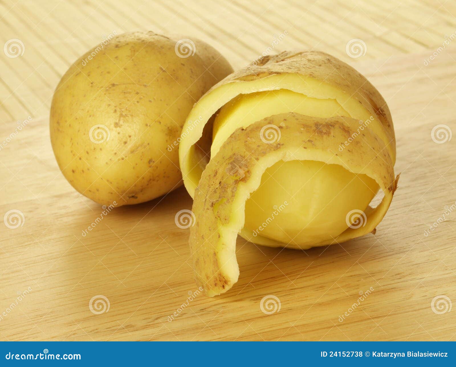 Peeled Potatoes With The Skin As A Spiral Pieces Of Potatoes Fal Stock ...