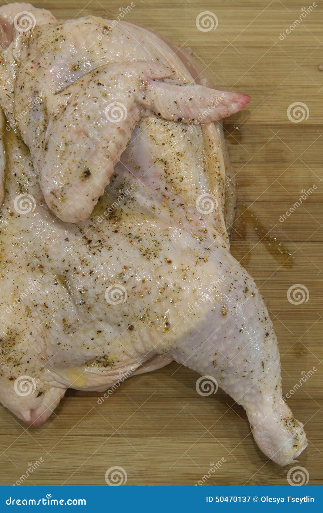 Half of Raw Chicken in Spices, Ready for Roasting. Stock Image - Image ...