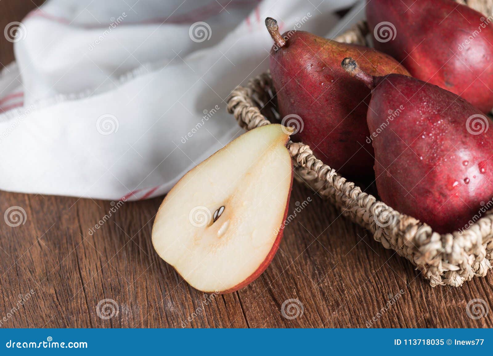 Half of Red Pear and Red Pear in Basket. Stock Image - Image of ...