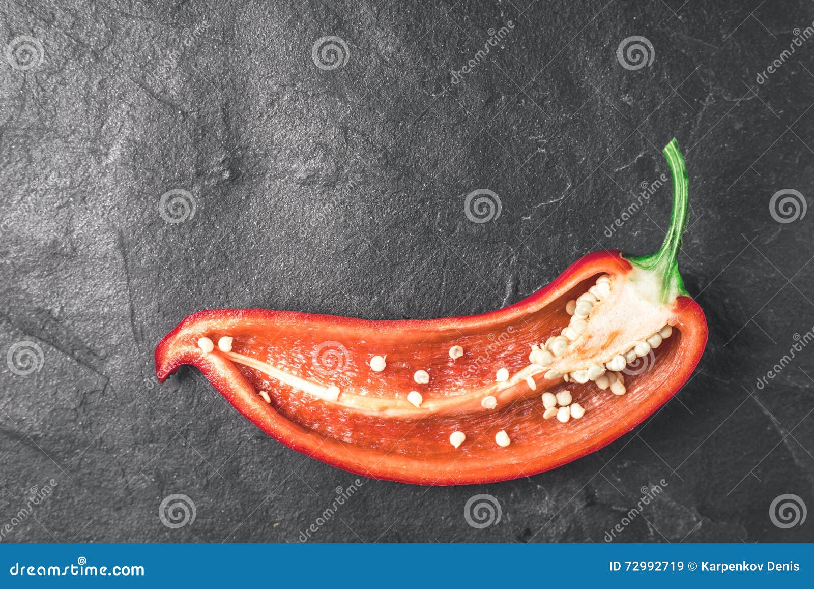 Half Red Pepper with a Green Branch on a Gray Stone Stock Image - Image ...