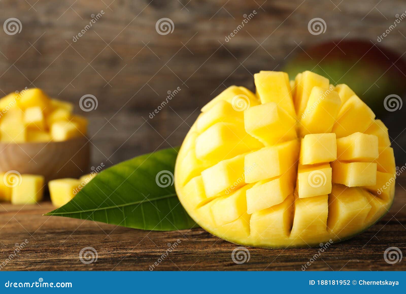 Half of Ripe Mango Cut into Cubes on Table Stock Photo - Image of ...