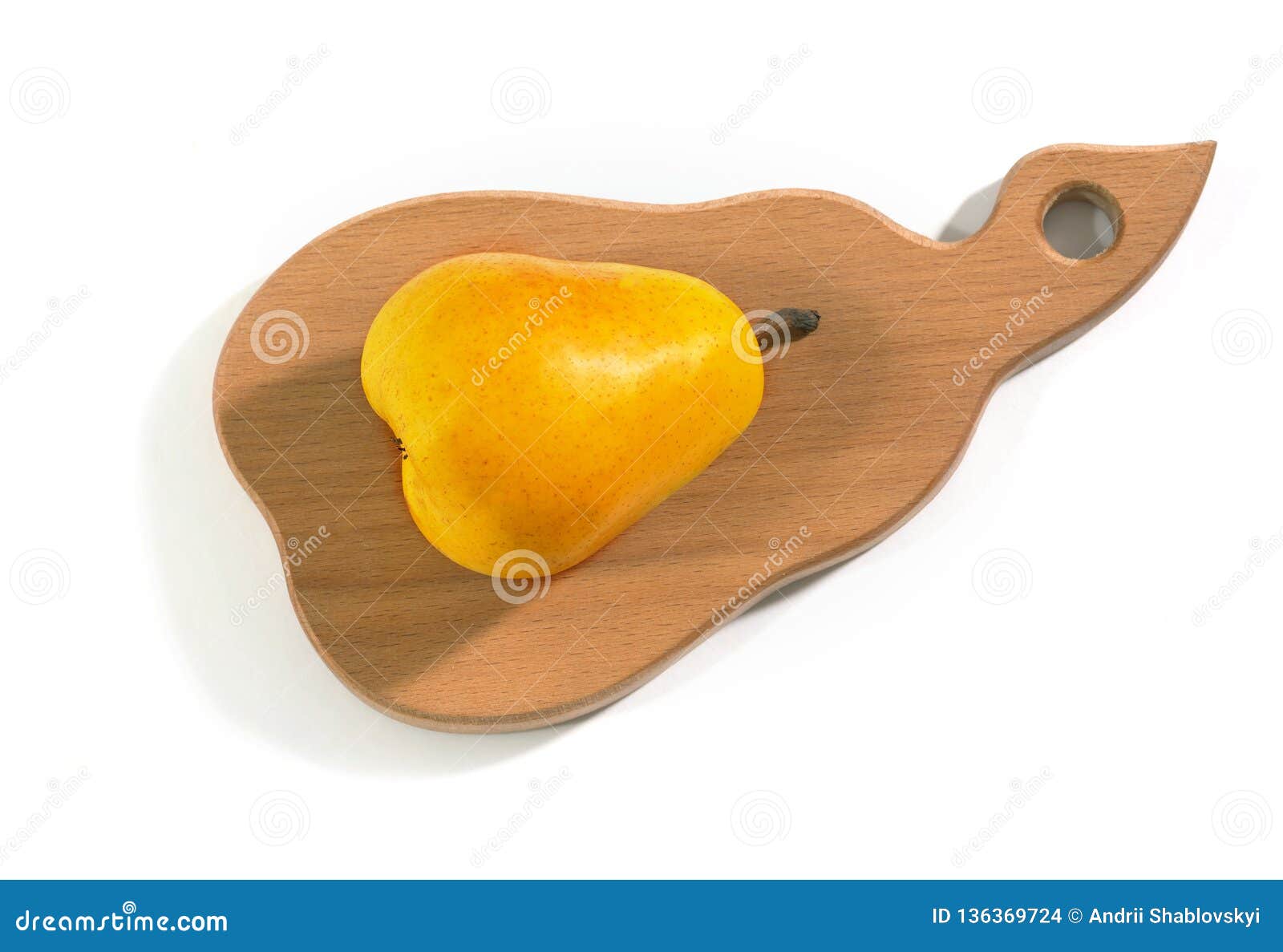 A Half of a Ripe Pear on a Tray, on the Isolated White Background, the ...