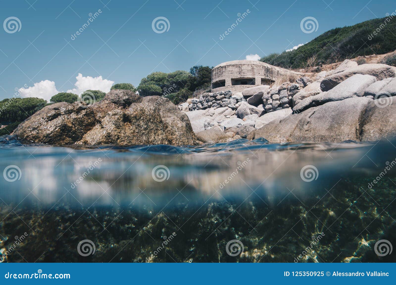 Half Underwater View of Shoreline with Old Turret Bunker Second War in ...