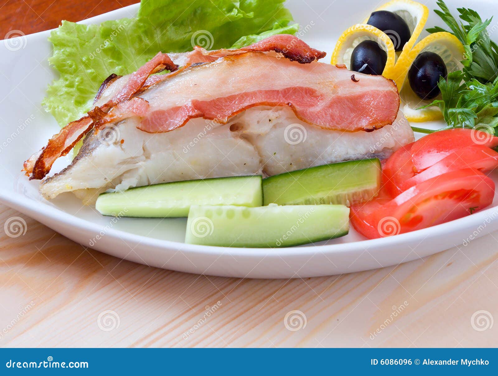 Halibut Prepared with Vegetables and Bacon Stock Photo - Image of ...