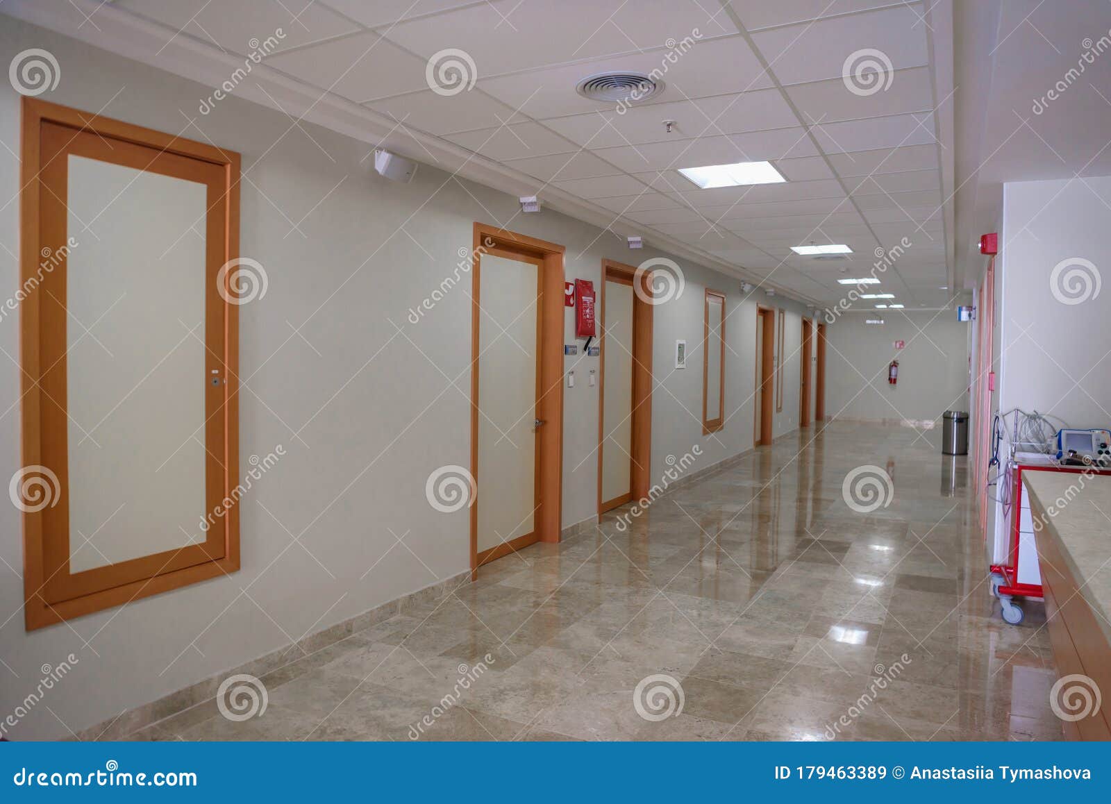 Hall in the Hospital, White Walls and Brown Doors Stock Image - Image ...