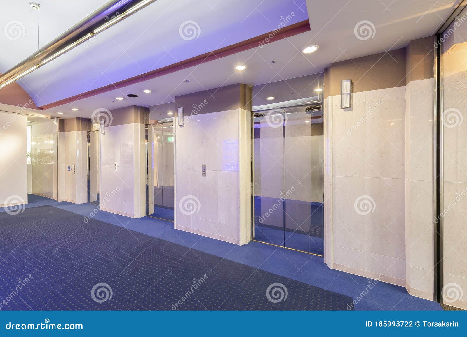 Hall with three elevators stock photo. Image of lobby - 185993722