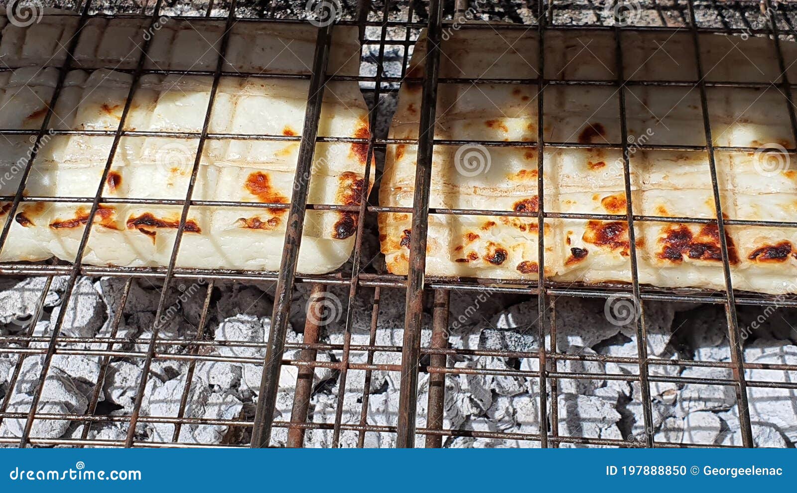 Halloumi Traditional Cypriot Cheese Cooking on Fire Stock Photo - Image ...