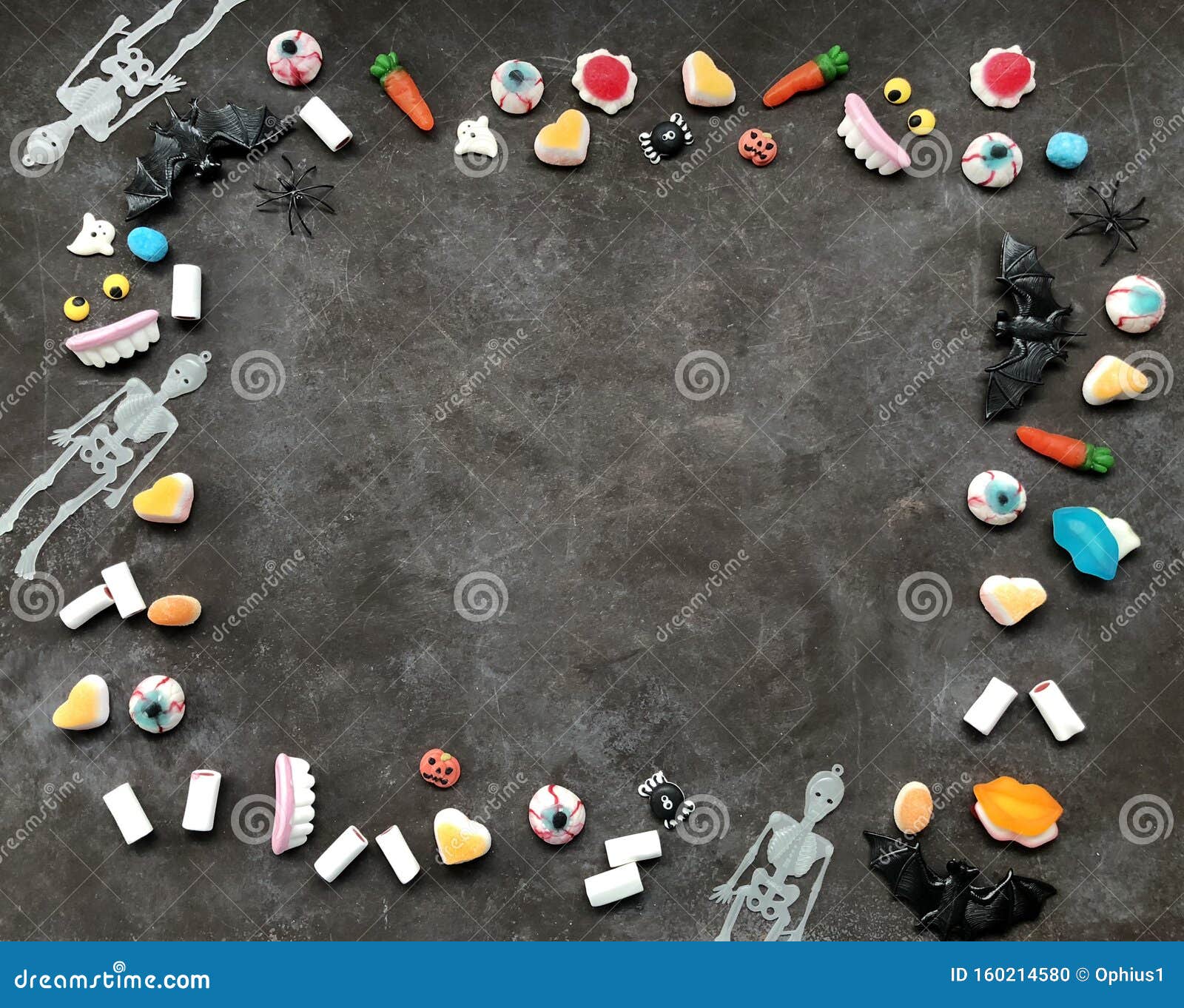 Halloween Candy Flat Lay on Textured Dark Background Stock Photo ...