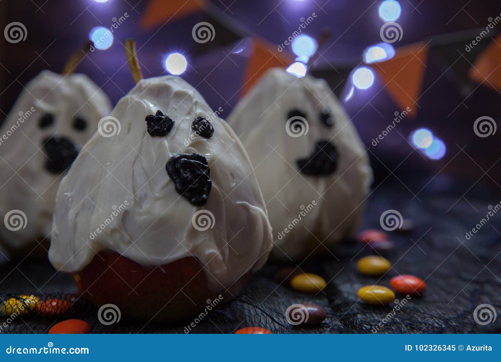 Halloween Candy Pears or White Chocolate Ghosts on a Stick Stock Image ...
