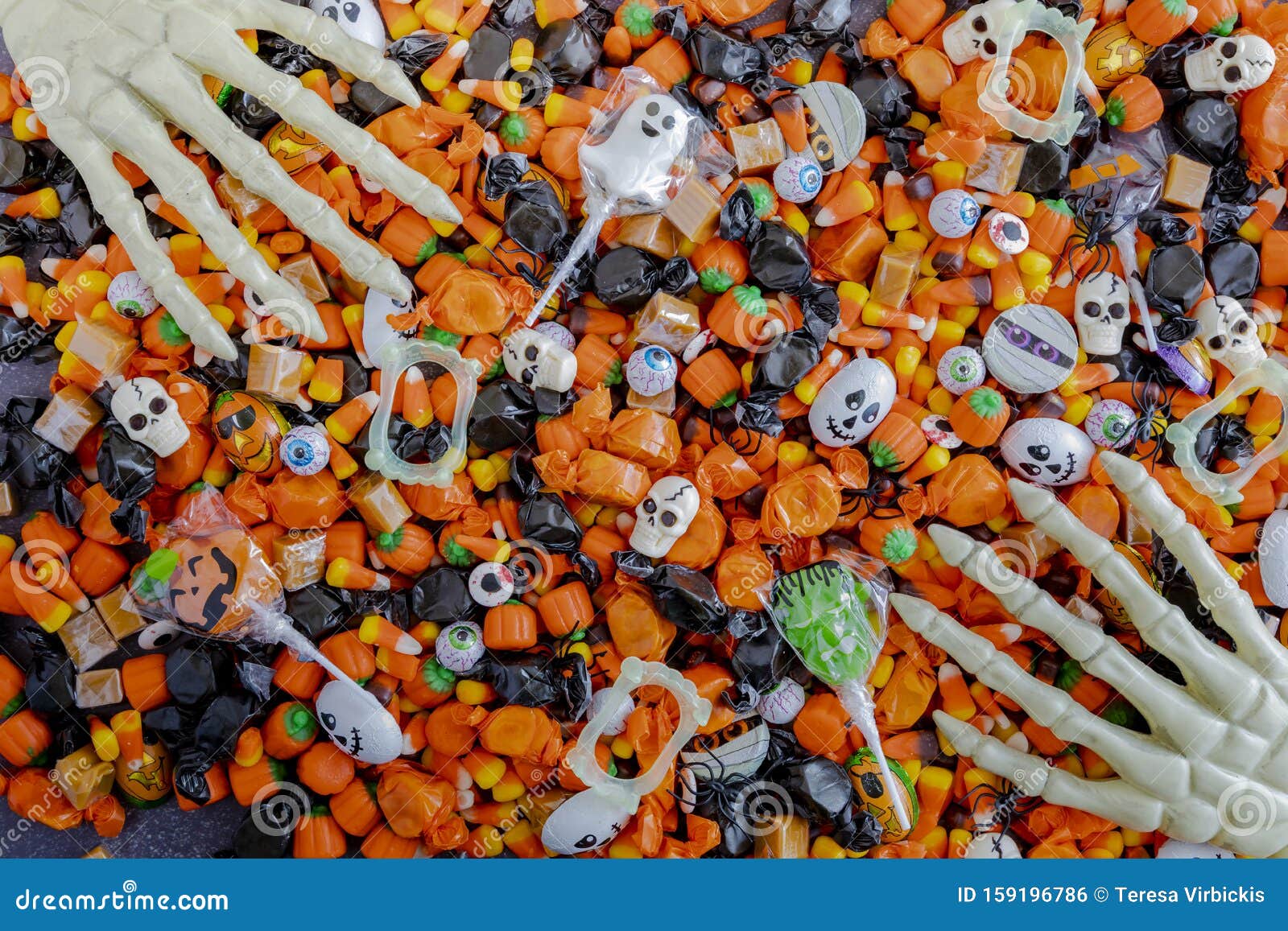 Halloween Candy Spilled Out on Table Stock Photo - Image of fangs ...