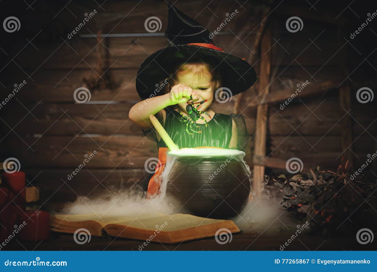 Halloween. Child Girl Witch Preparing Potion in Cauldron Stock Image ...