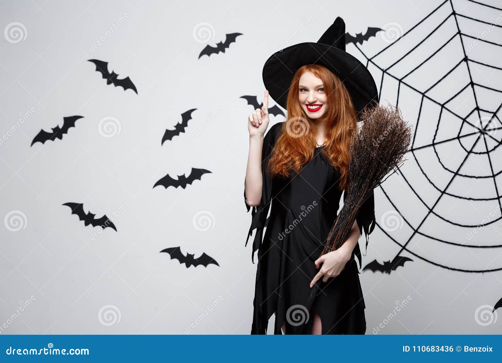 Halloween Concept - Happy Elegant Witch with Broomstick Halloween Doing ...