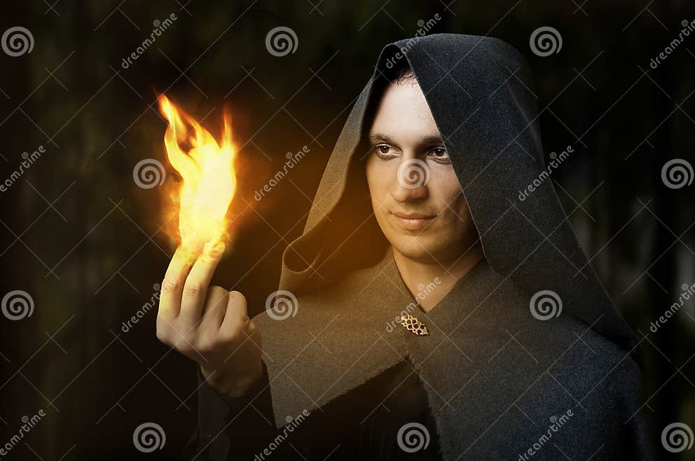 Halloween Concept. Powerful Male Witch Stock Photo - Image of cowl ...