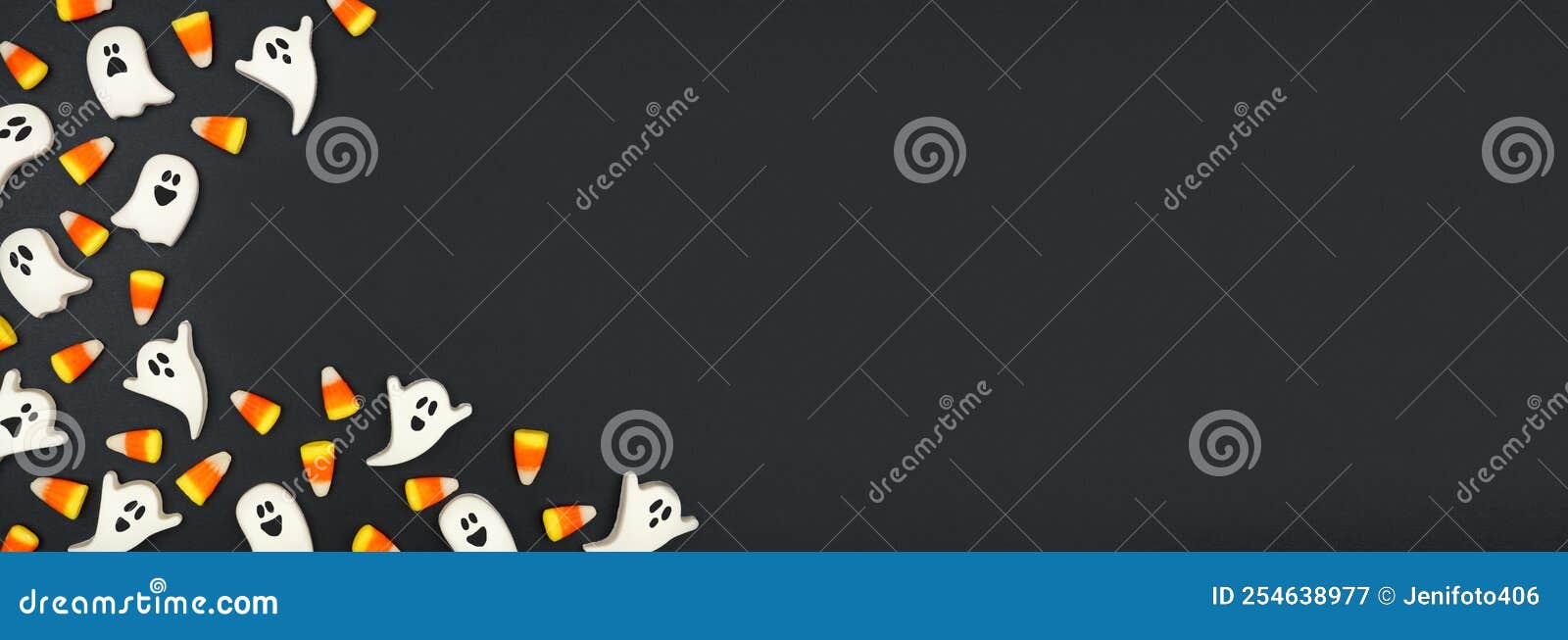 Halloween Corner Border Of Candy Corn And Spooky Chocolate Ghosts On A ...