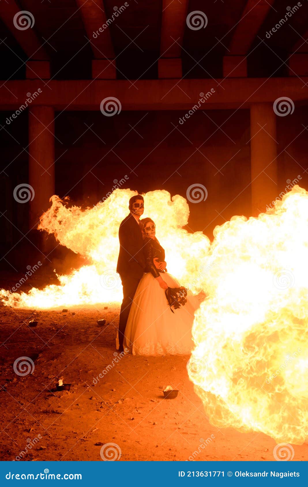 Halloween Couple Standing with Flamethrower. Big Fire Stock Image ...