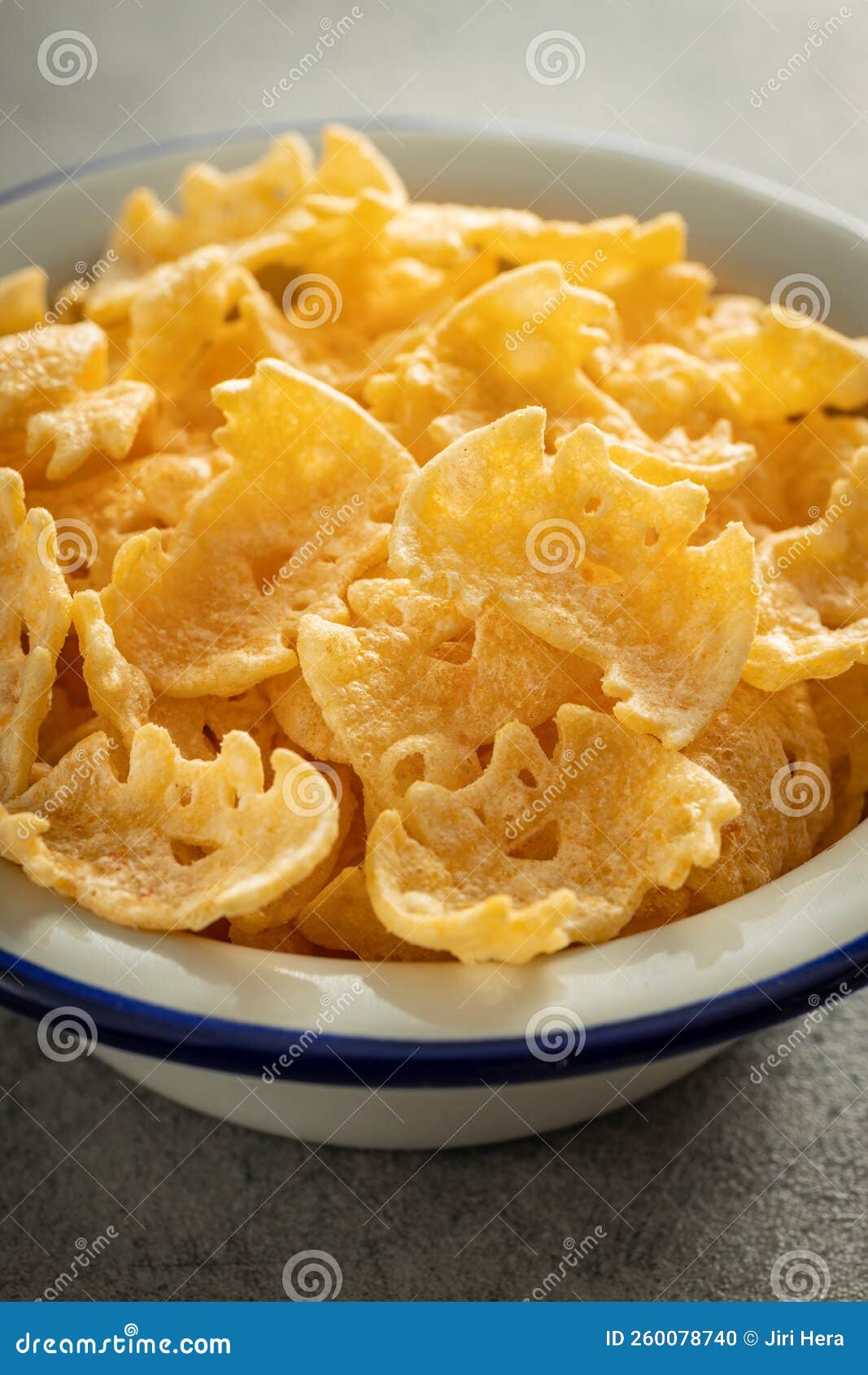 Halloween Crispy Bat Shaped Chips in Bowl Stock Photo - Image of ...