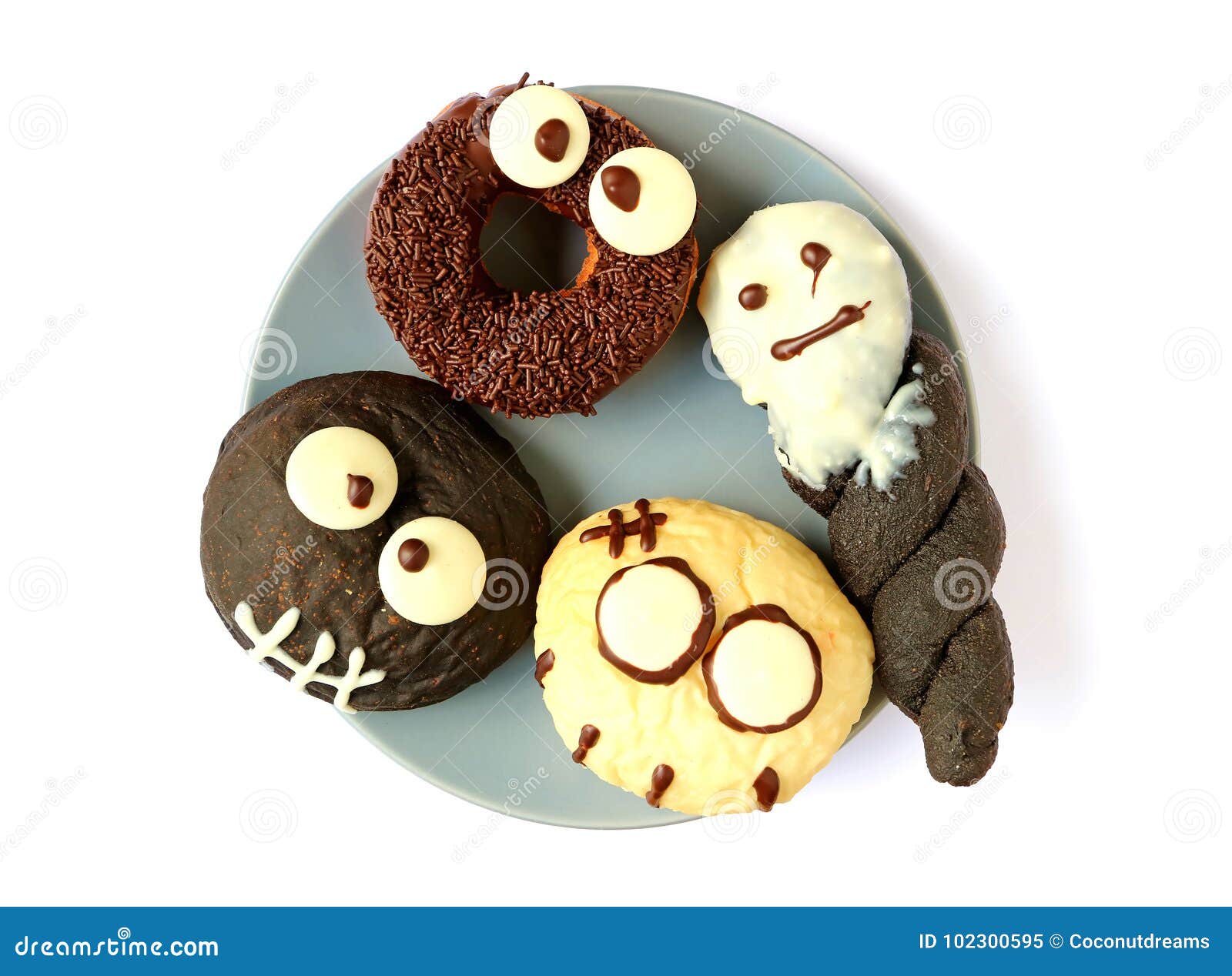 Halloween Ghosts and Monsters Shaped Doughnuts Served on the Plate ...