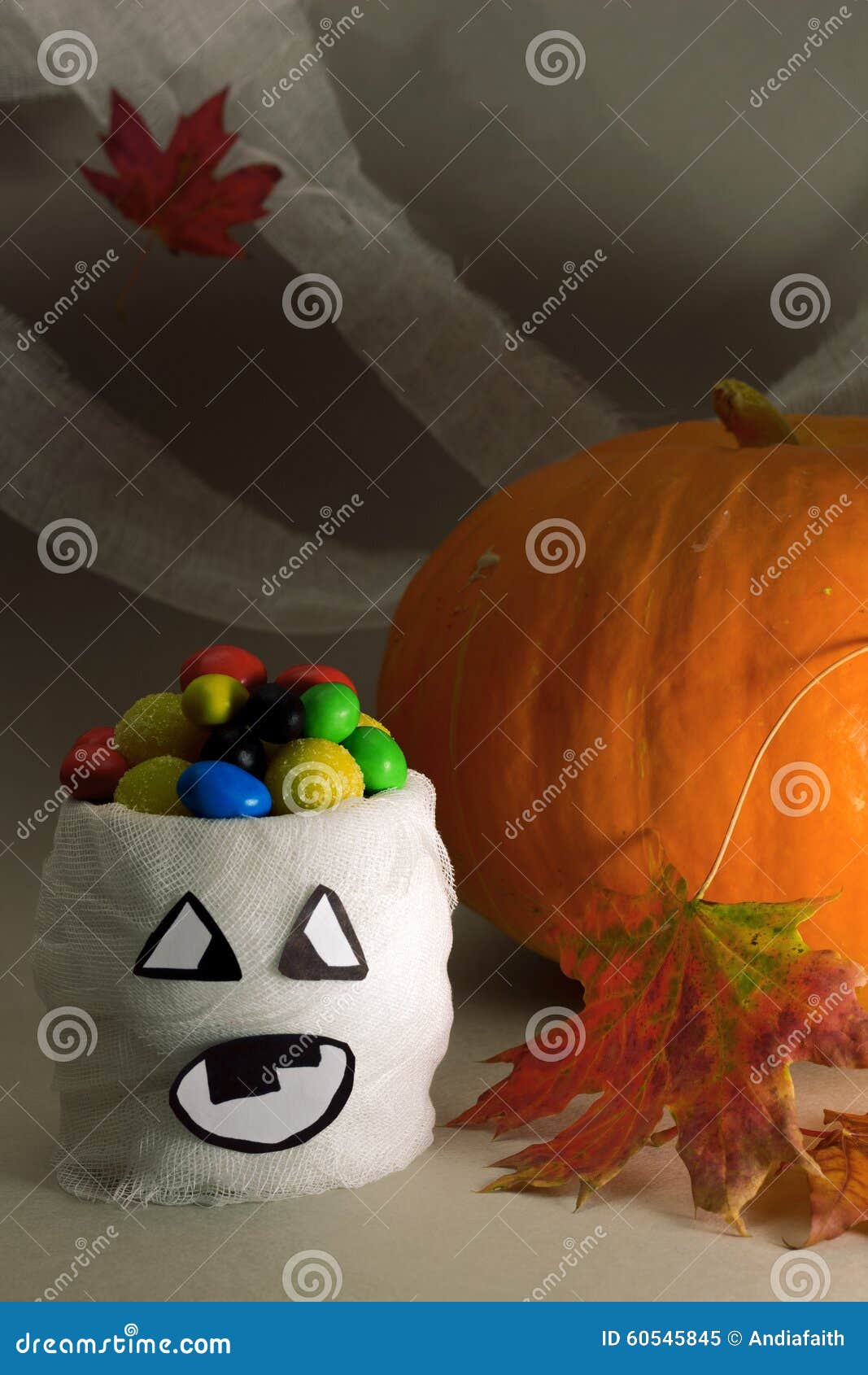 Halloween. Mummy-bowl with Candies and Pumpkin Stock Image - Image of ...