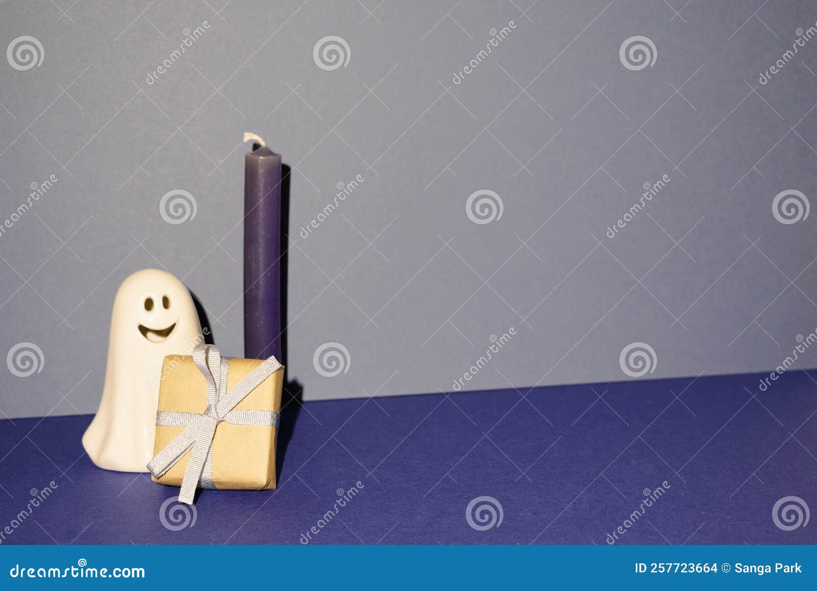 Halloween Party Decor, Ghost and Gift Box, Candle on Blue Background ...