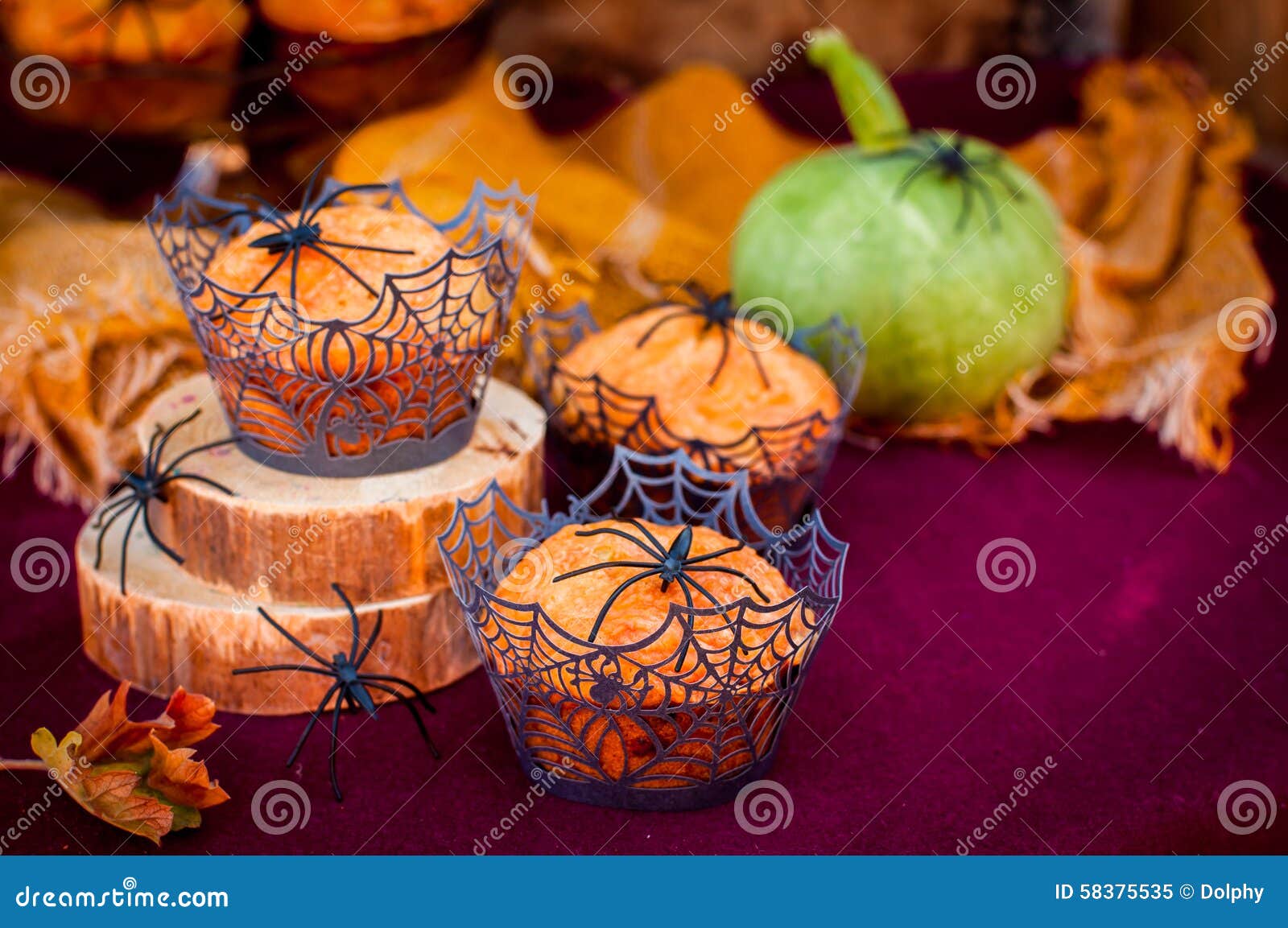 Halloween Pumpkin Muffins Decorated with Spiders and Spider Web Stock ...