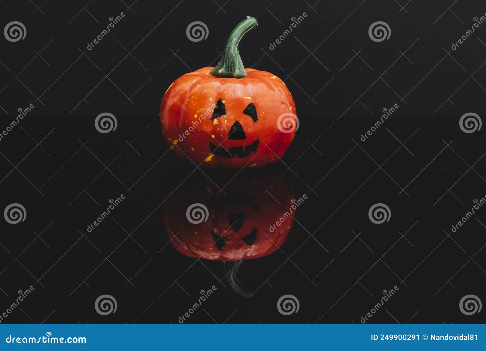 Halloween Pumpkin on a Reflective Surface Stock Image - Image of ...