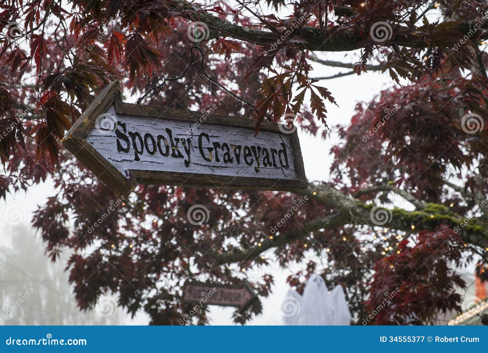 Spooky Graveyard With Zombie Hand Coming Out Of The Ground Stock Photo ...