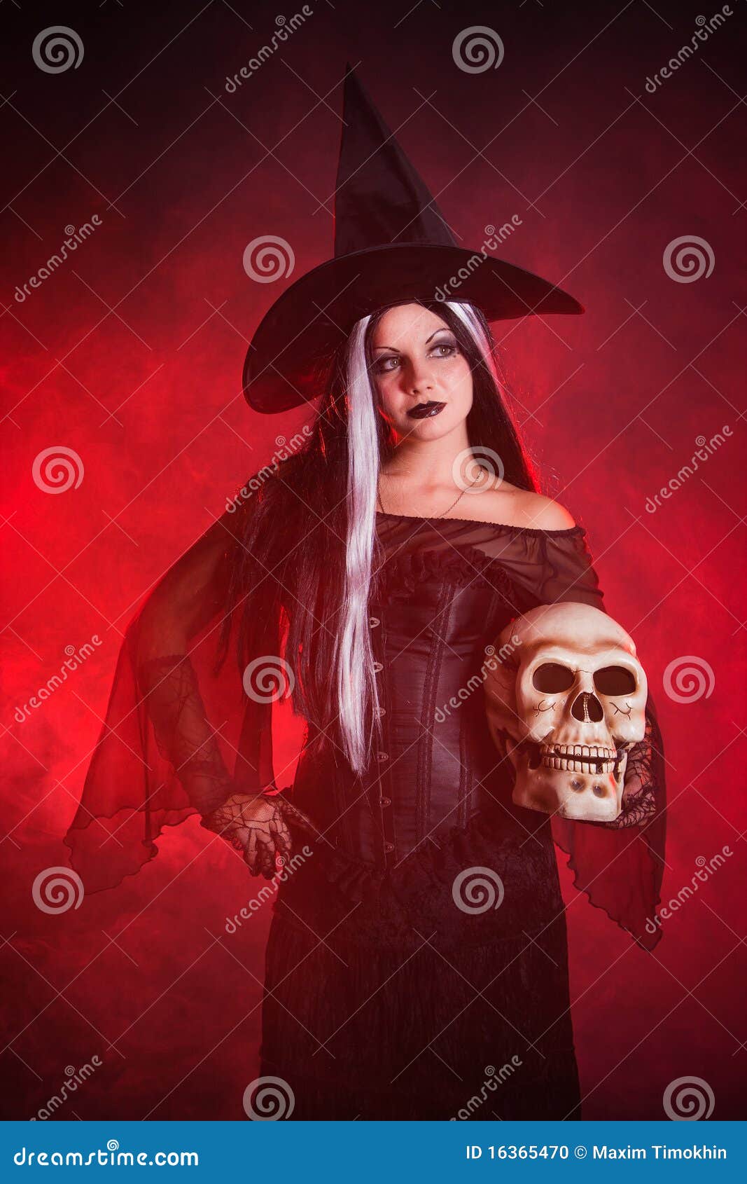 Halloween Witch with a Skull Stock Photo - Image of holding, creepy ...
