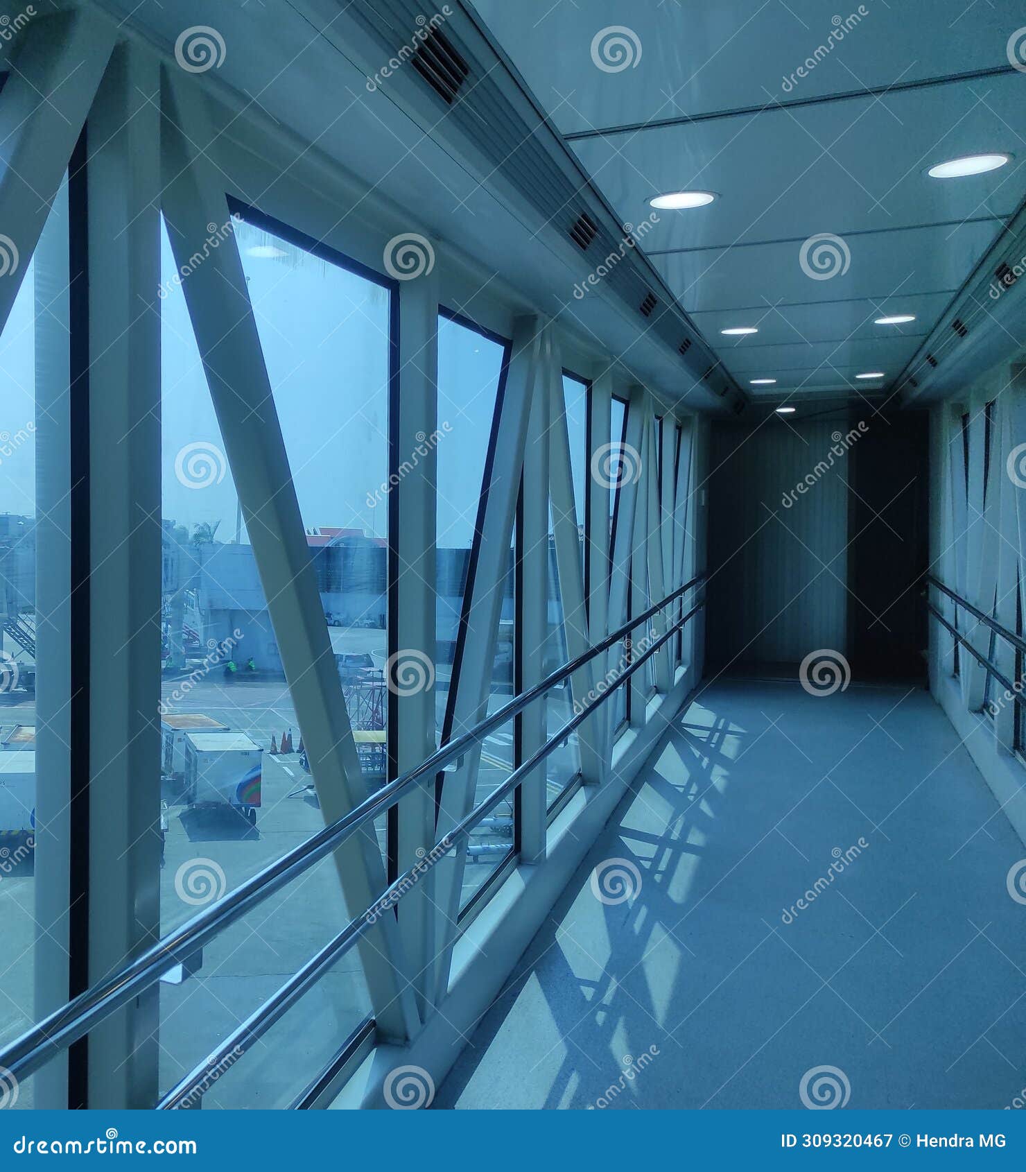 In the Hallway of a Boarding Bridge at the Airport Stock Image - Image ...