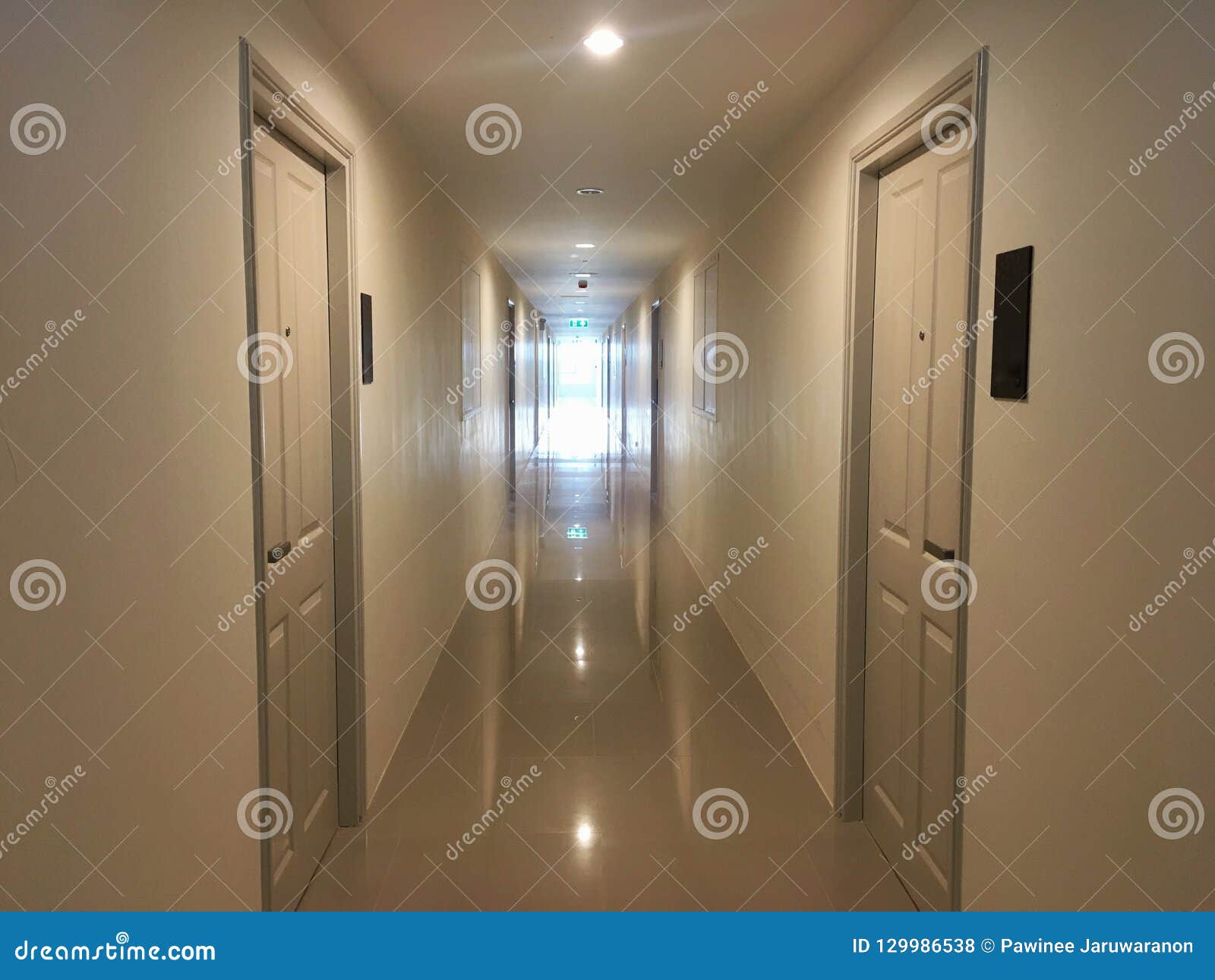 Hallway Inside Condo with Nature Lighting through Window and Bulb ...