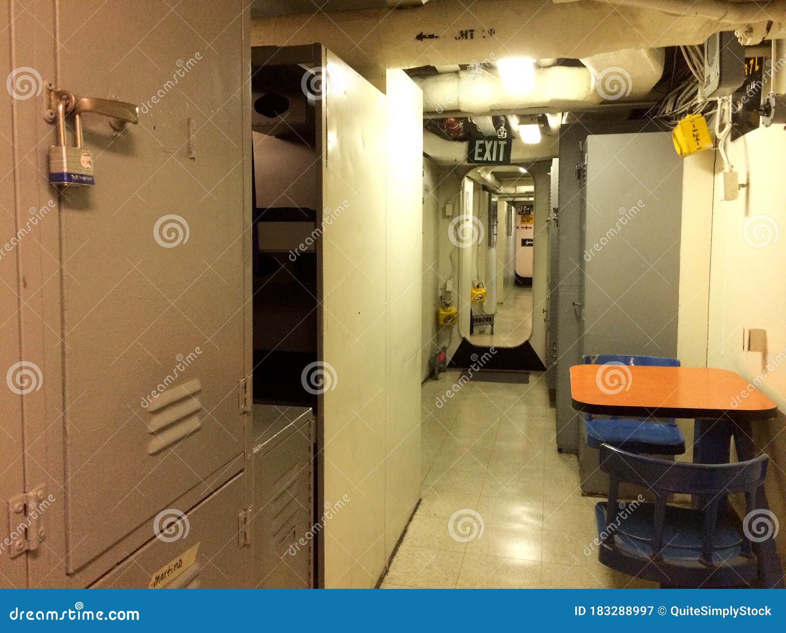 Hallway Passageway with Exit Sign and Locker on Ship Stock Image ...