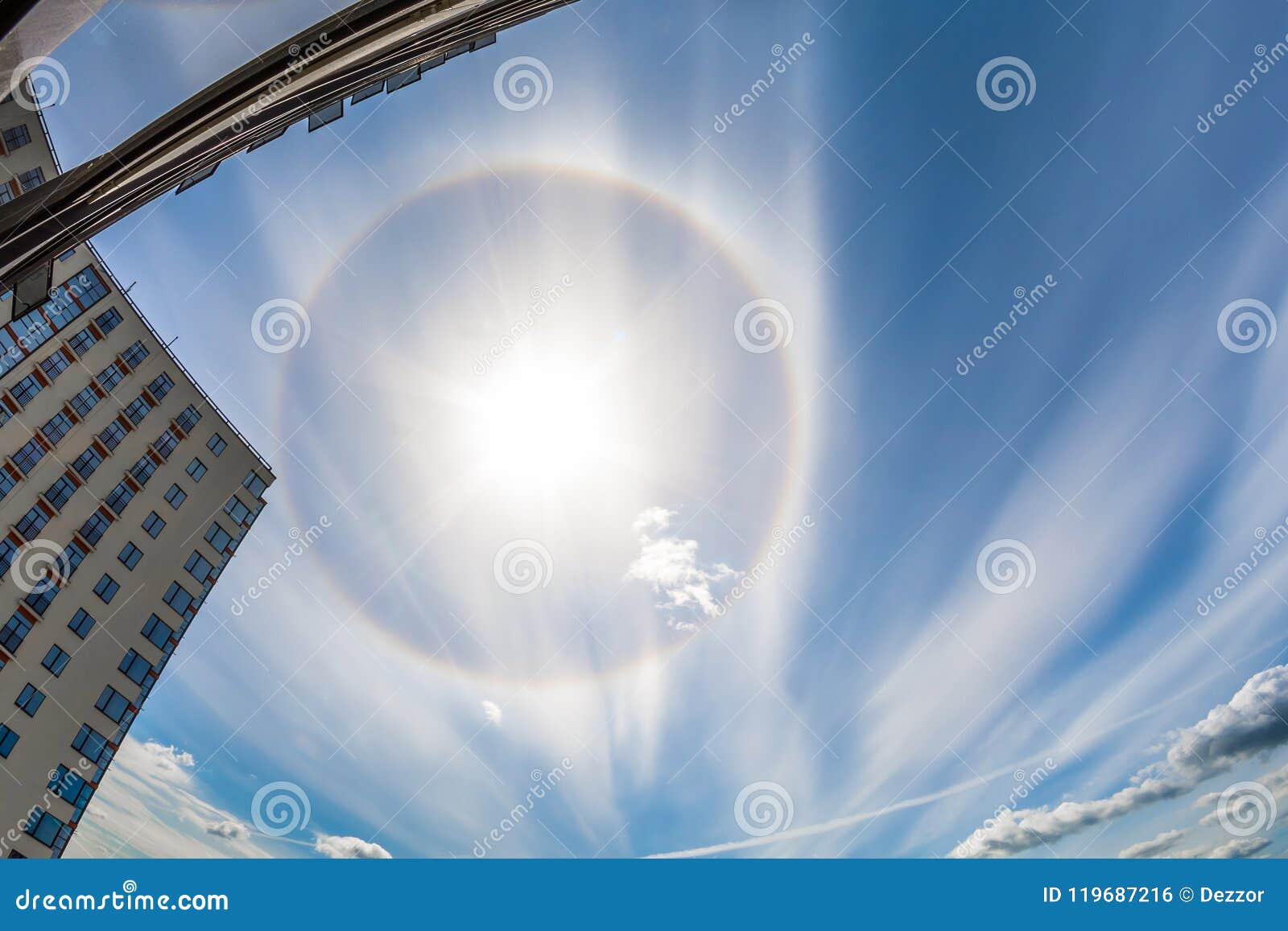 Halo Sun in the Clouds of Cirrus on the City. Stock Photo - Image of ...