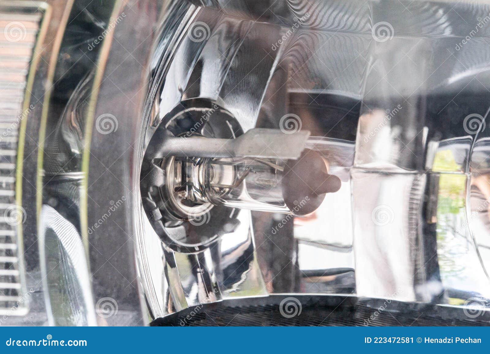 Halogen Bulb in Headlight with Reflector of a Passenger Car, Macro ...