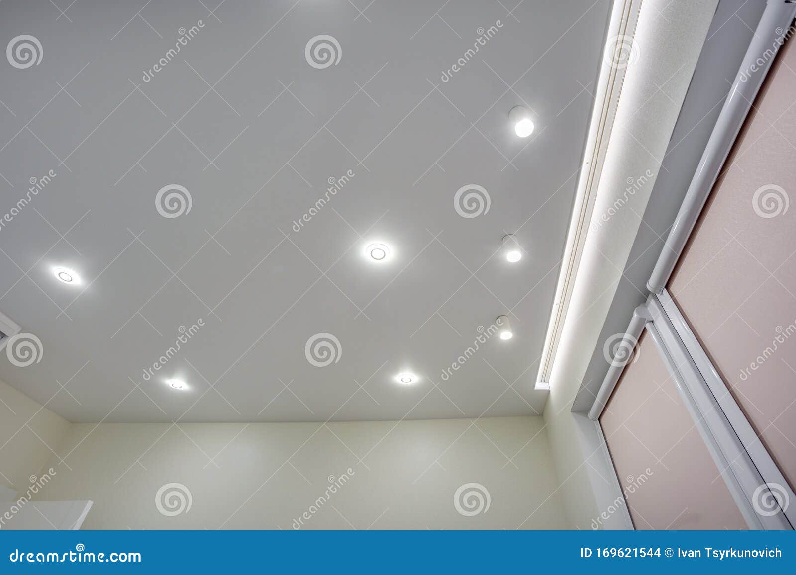 Halogen Spots Lamps on Suspended Ceiling and Drywall Construction in in ...