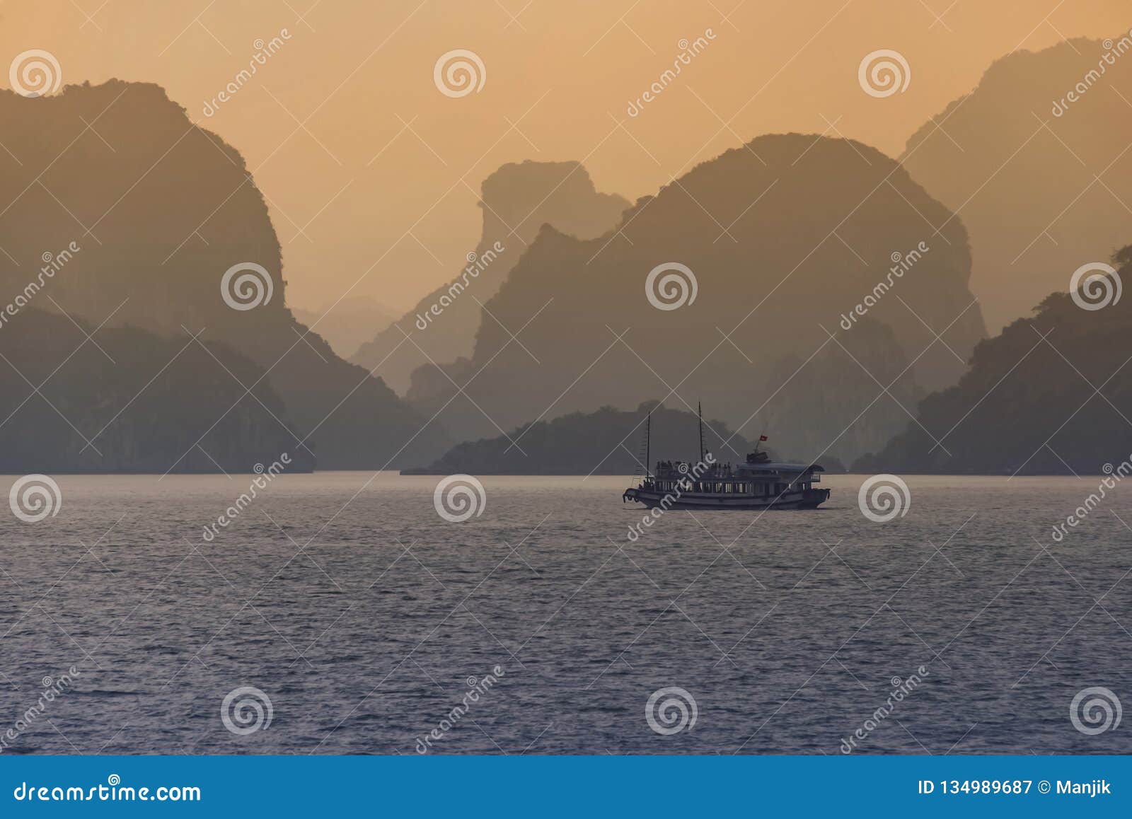 Halong bay at sunrise stock image. Image of mountain - 134989687