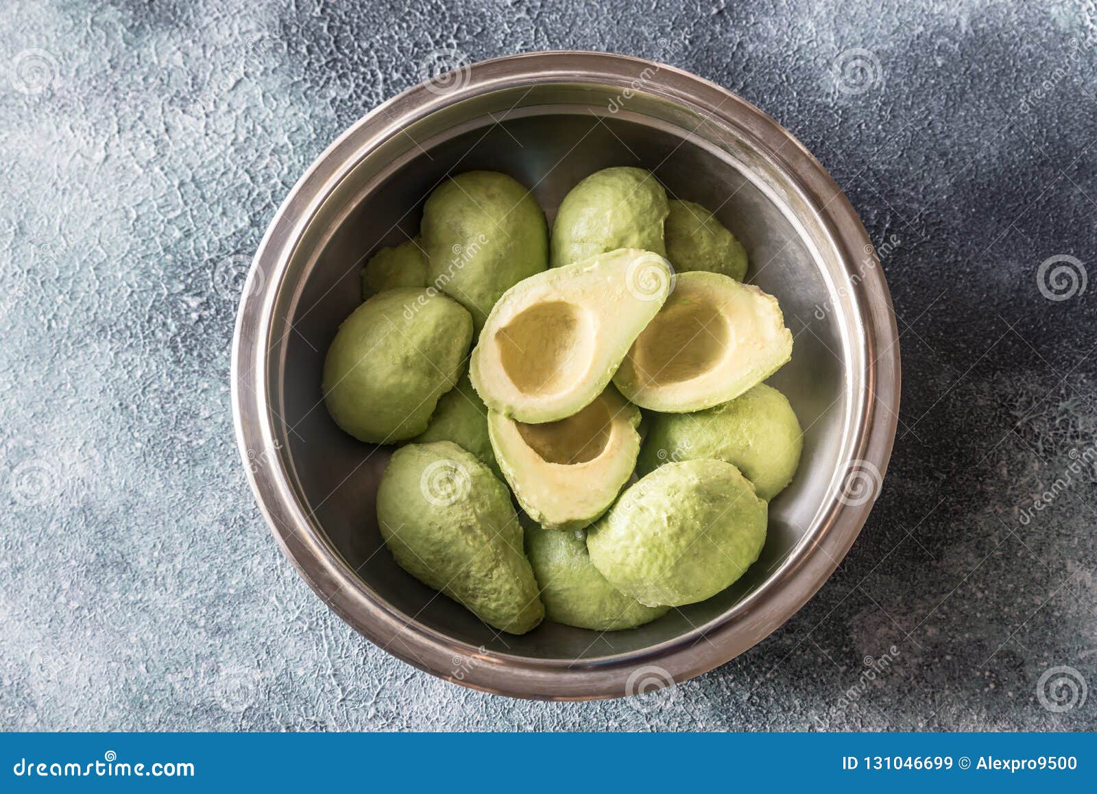 Halved Avocados in the Metal Bowl Stock Image - Image of avocado, hass ...