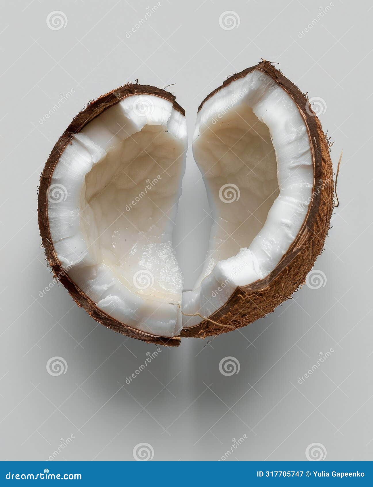 Halved Coconut on Table stock image. Image of coconut - 317705747