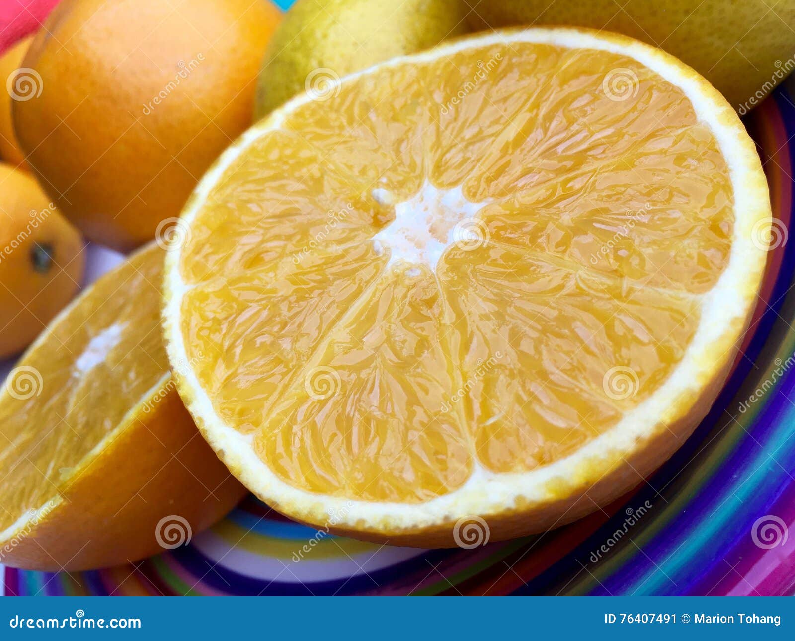 Halved orange in closeup stock image. Image of closeup - 76407491