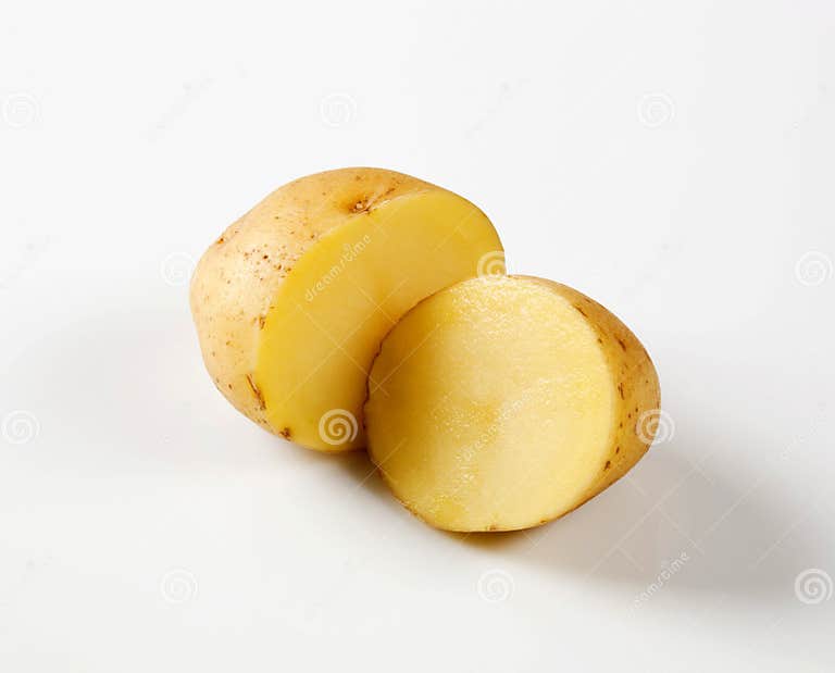 Halved potato stock image. Image of root, studio, uncooked - 18335459