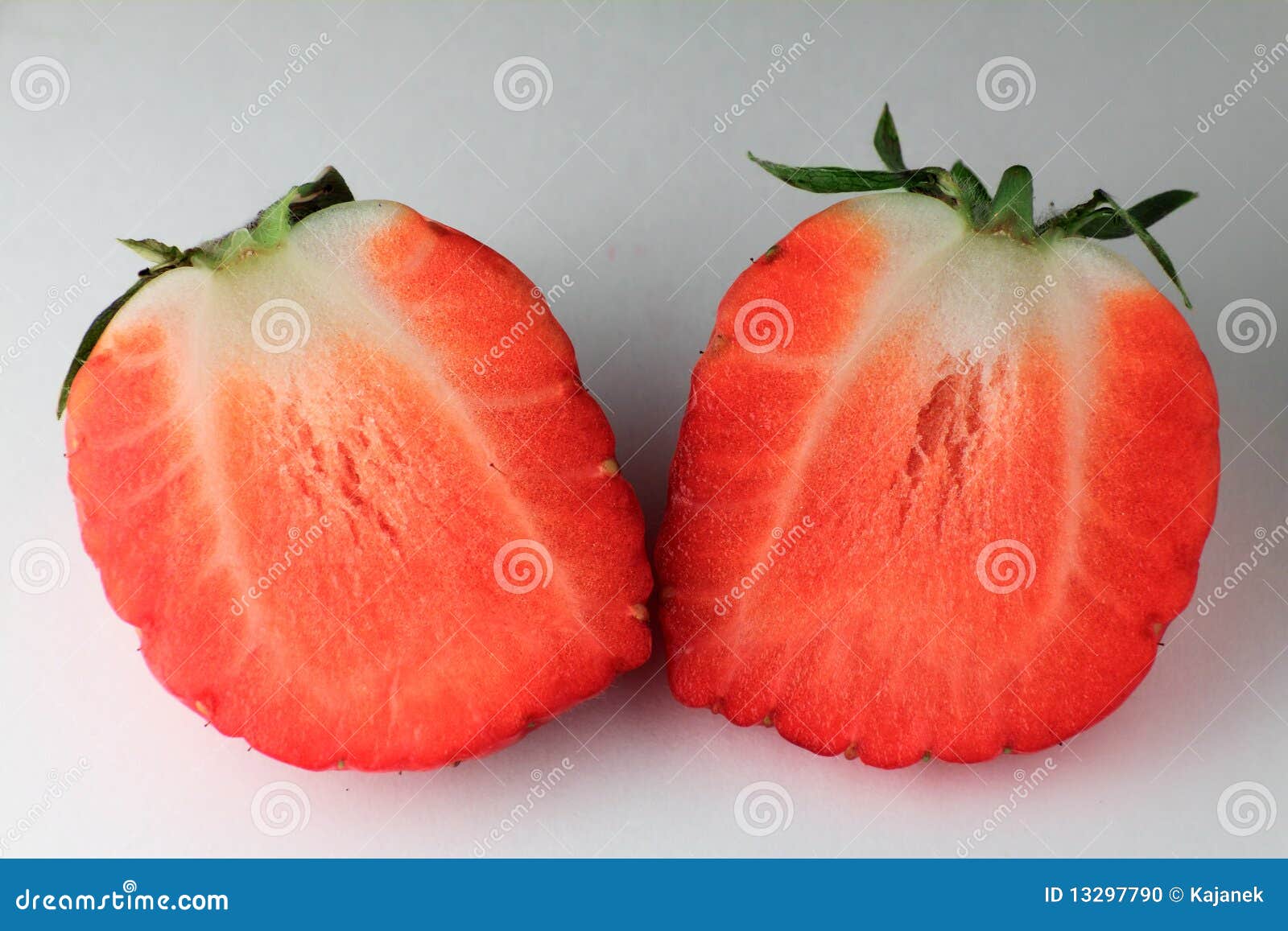 The Halved Red Strawberry on the Light Background Stock Photo - Image ...