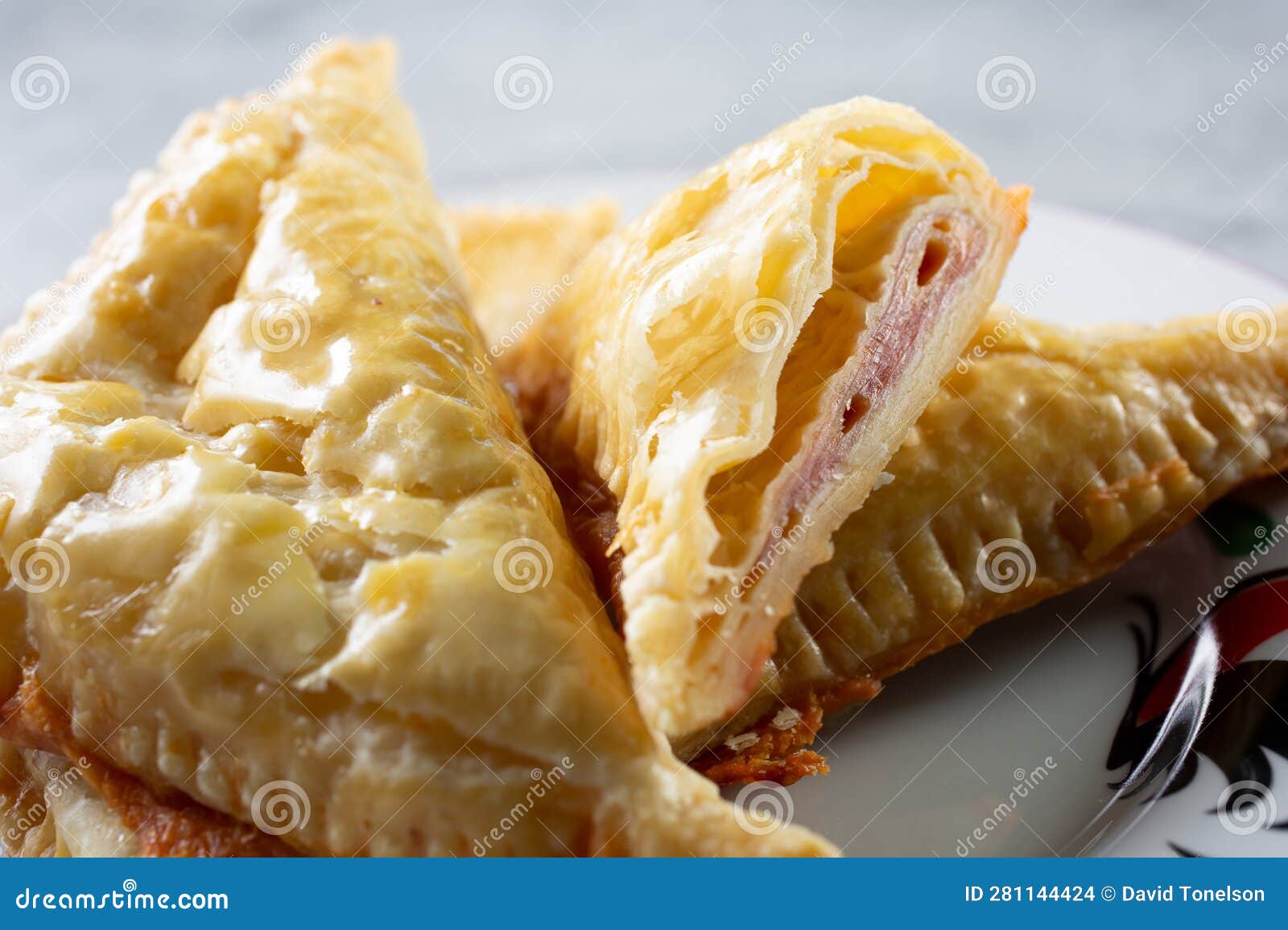 Ham and cheese turnover stock photo. Image of puff, plate - 281144424