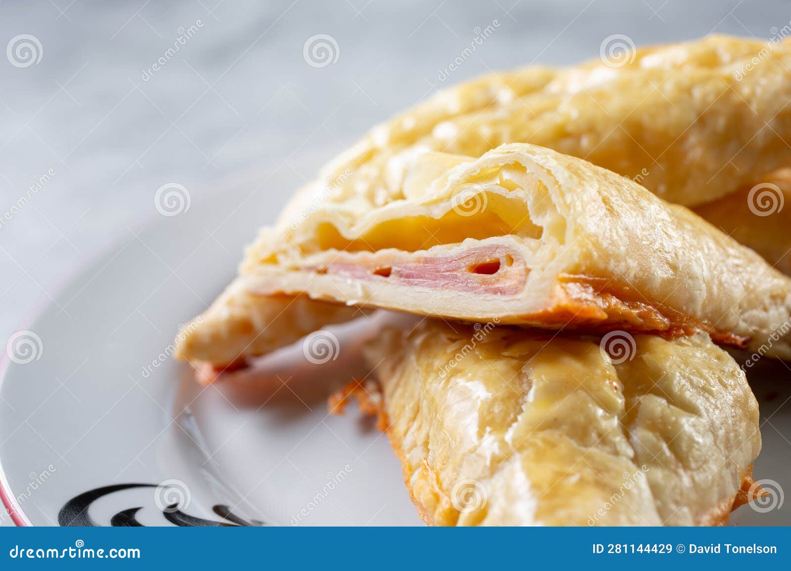 Ham and cheese turnovers stock image. Image of open - 281144429