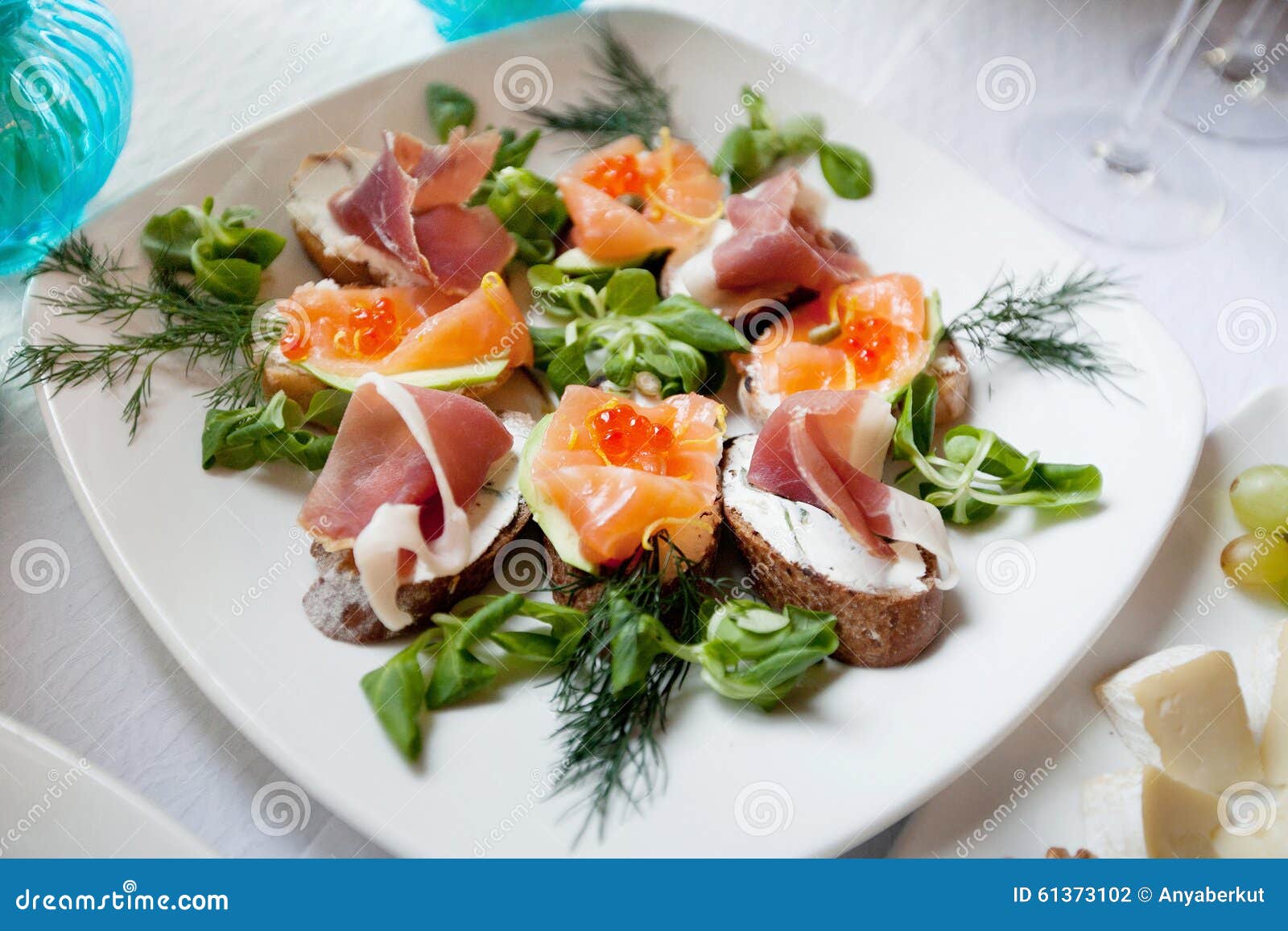 Ham and fish in restaurant stock photo. Image of banquet - 61373102