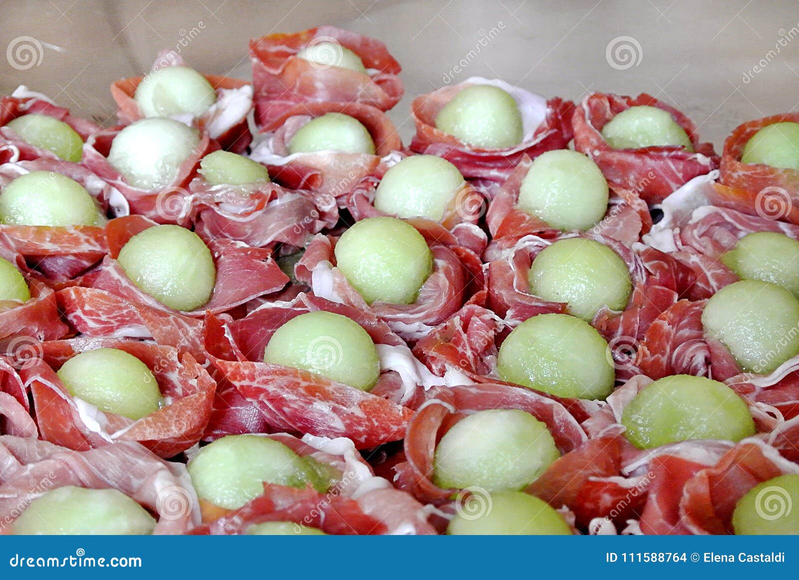 Ham and melon appetizer stock photo. Image of color - 111588764
