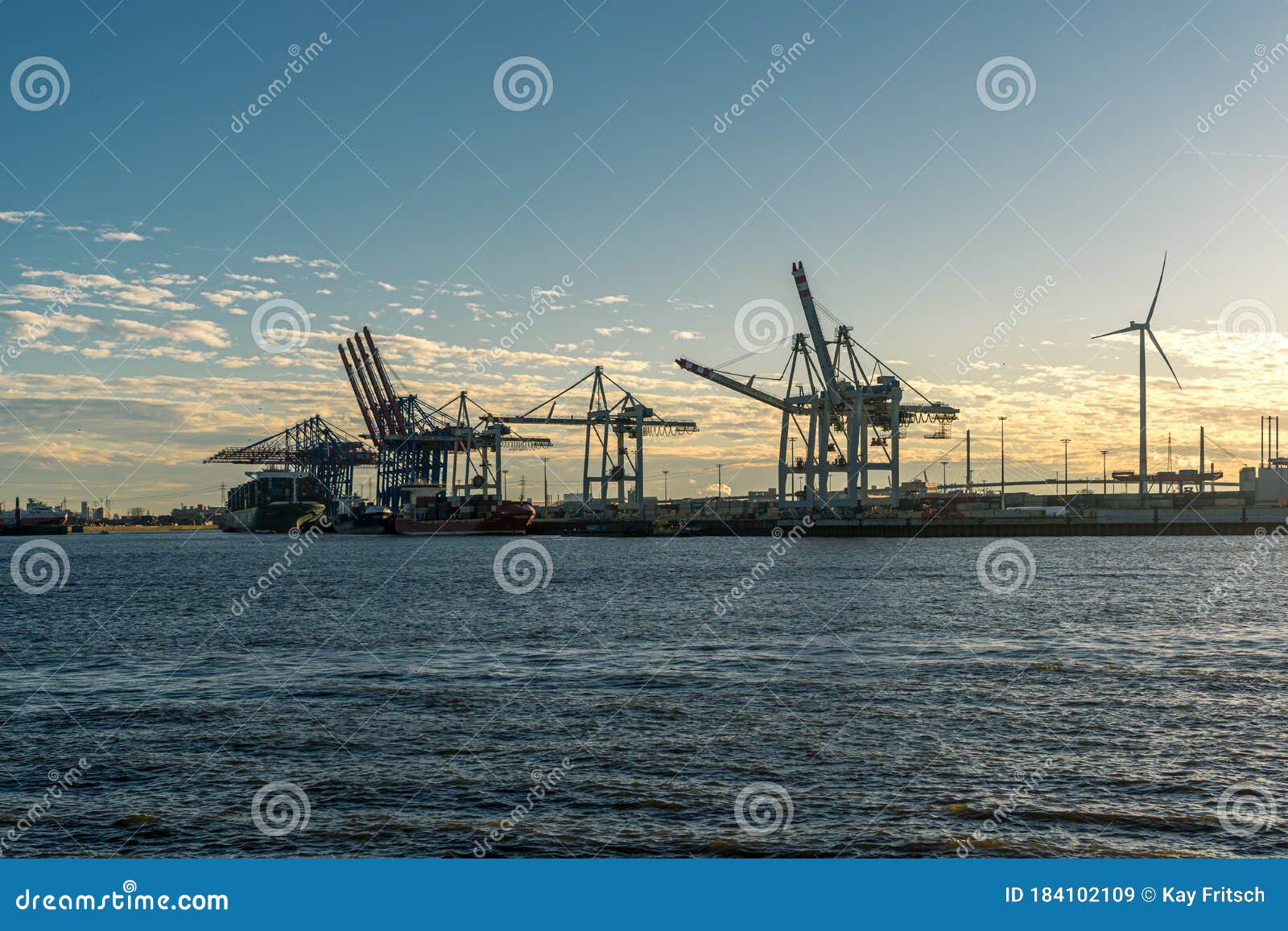 Hamburg Container Port with Some Ships Loading and Cranes Editorial ...