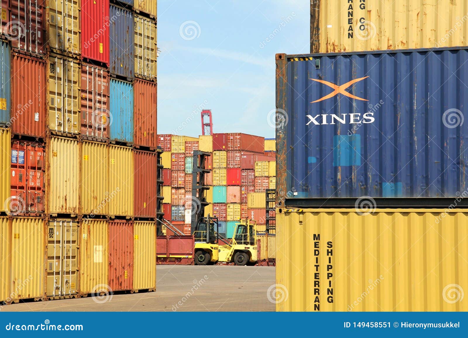 Stacked Shipping Containers and Empty Container Handler Editorial Photo ...