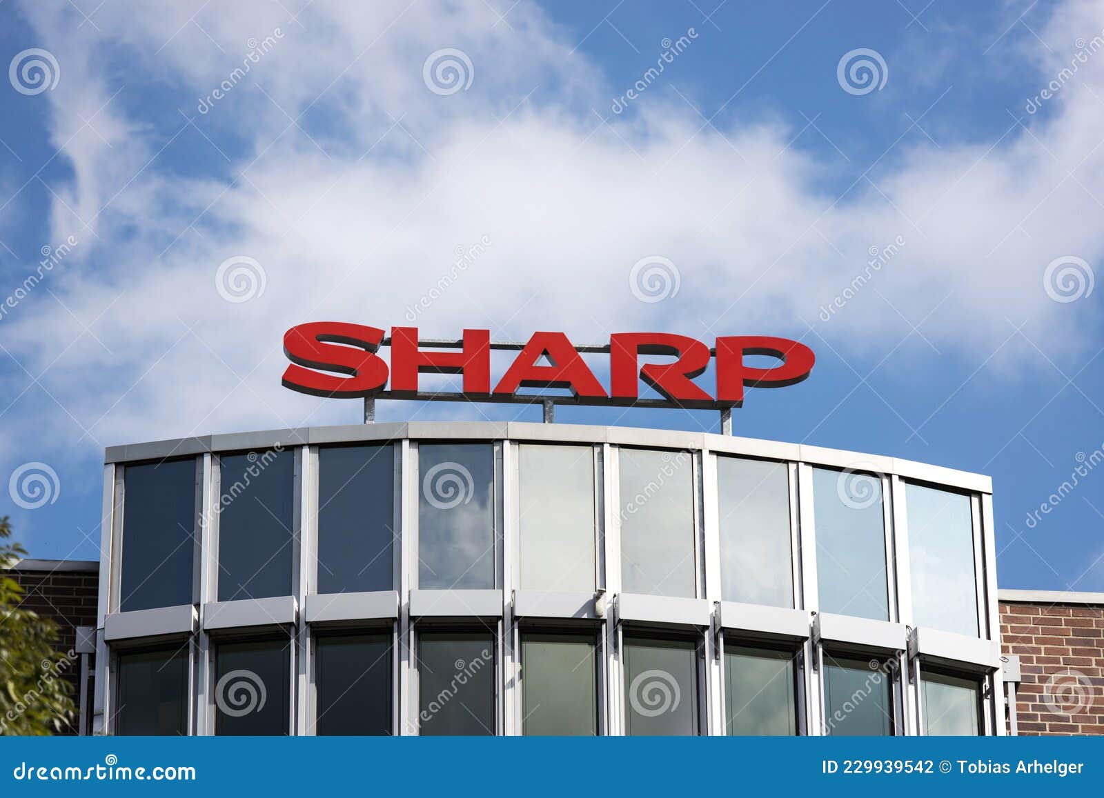 Sign of Sharp on a Building Editorial Photography - Image of company ...