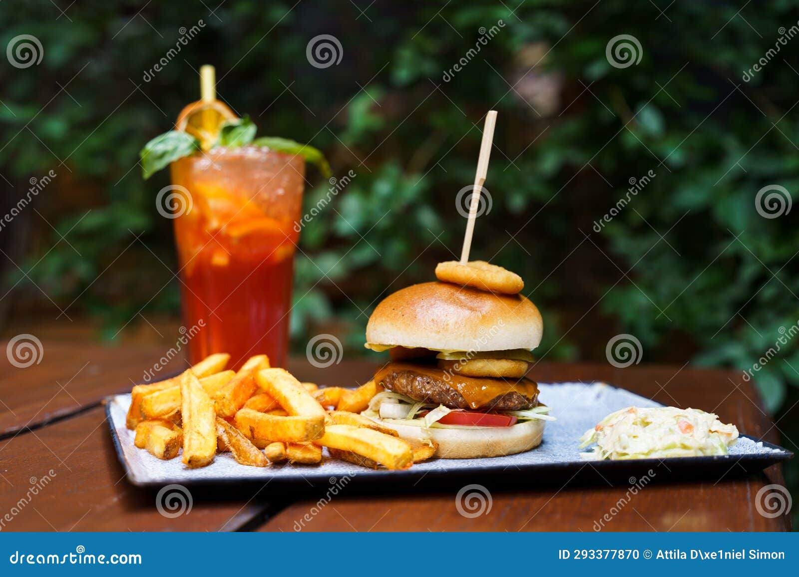 Hamburger with Potatoes, Onion Ring, Coleslaw and Lemonade Stock Photo ...