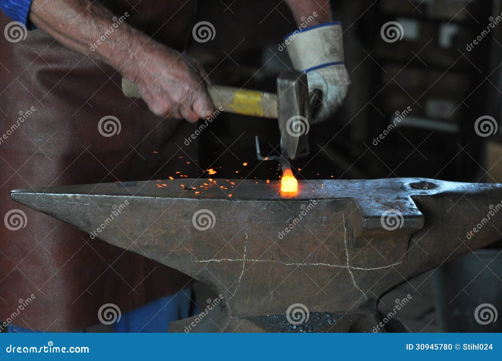 Hammer and anvil stock photo. Image of action, glowing - 30945780
